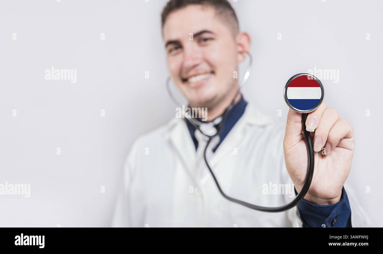 Doctor showing stethoscope with Dutch flag. Netherlands national ...