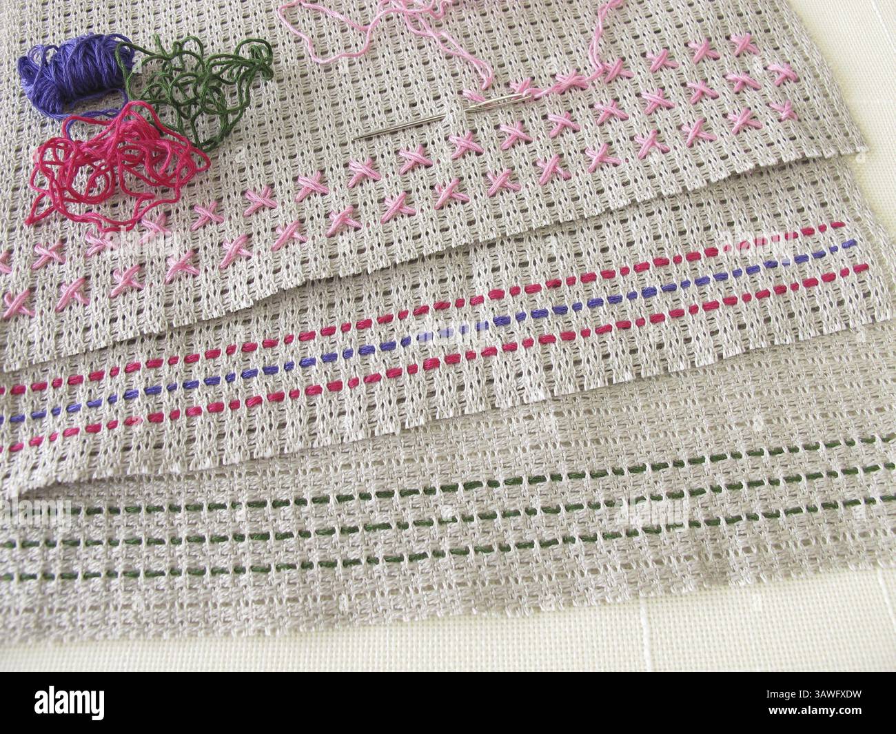 Various simple embroidery stitches on canvas Stock Photo - Alamy