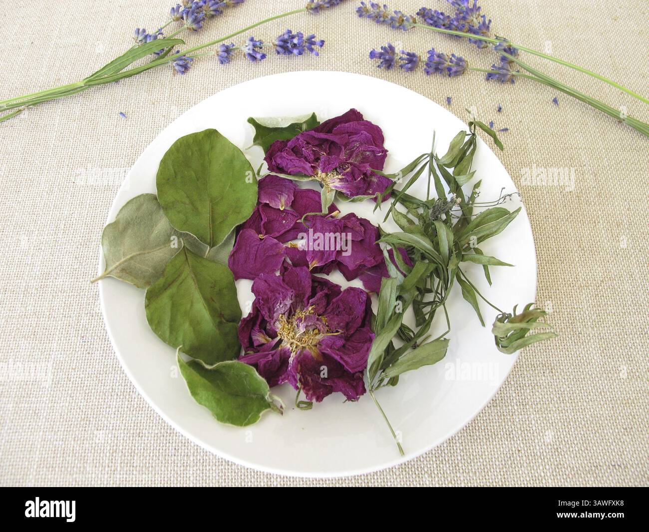 Fragrant potpourri with rose petals, woodruff, quince leaves and ...