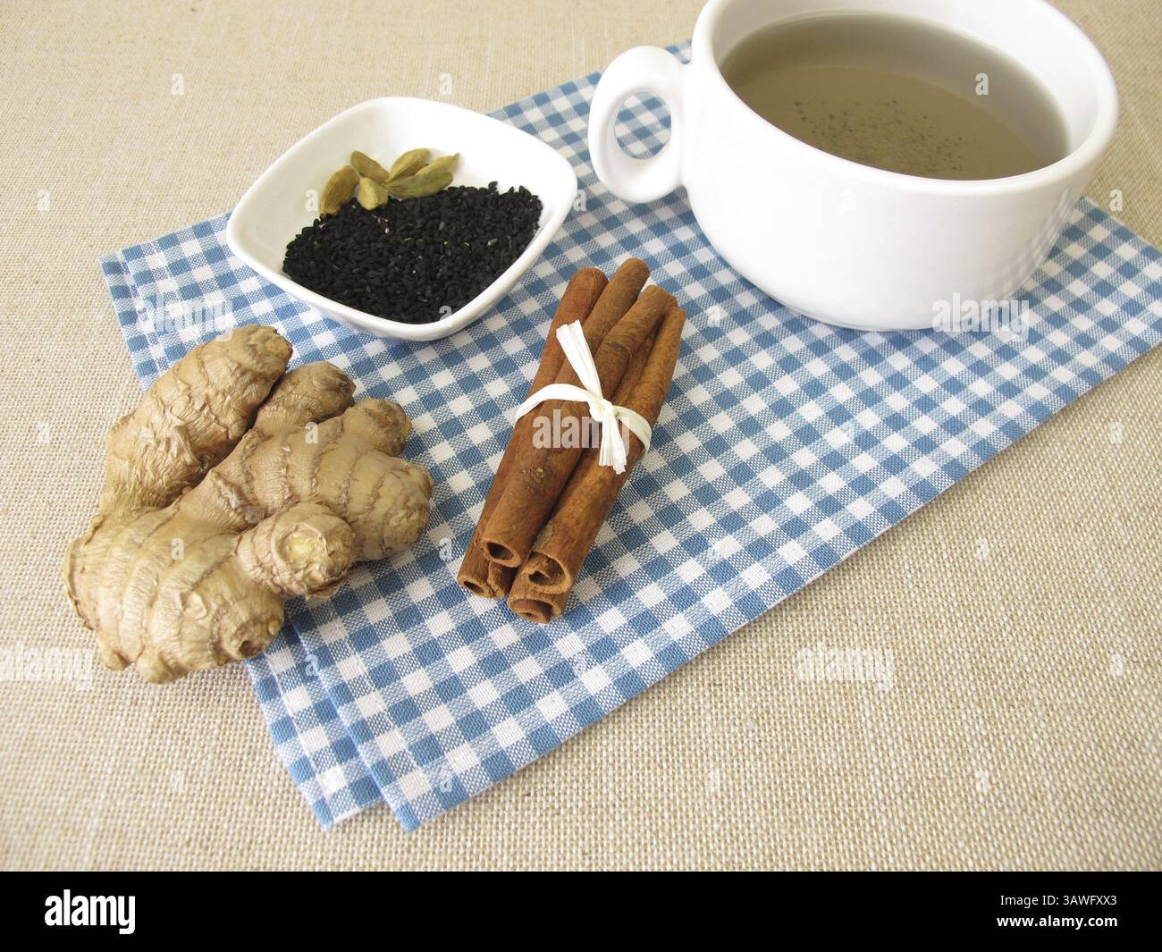 Chai spiced tea, tea with black cumin, ginger, cinnamon, cardamom Stock ...