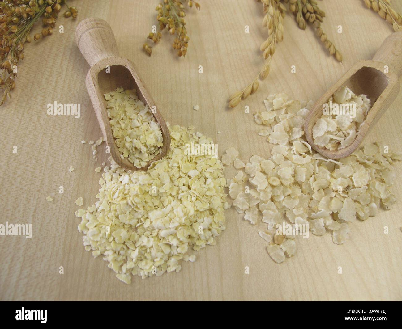 Millet flakes and rice flakes Stock Photo - Alamy