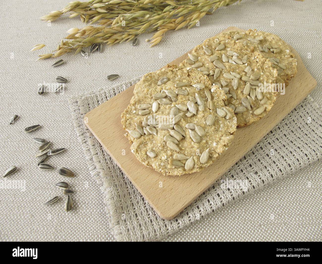 Round oat crispbread with sunflower seeds Stock Photo - Alamy
