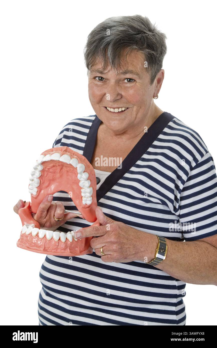Senior woman with artificial dentures - isolated Senior woman with ...
