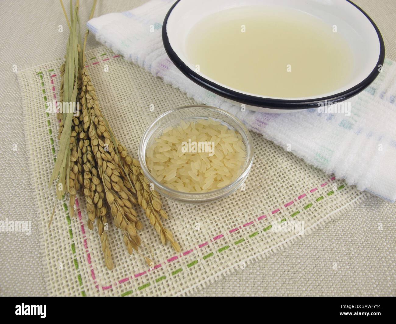 Rice water bath additive in a wash bowl Stock Photo - Alamy