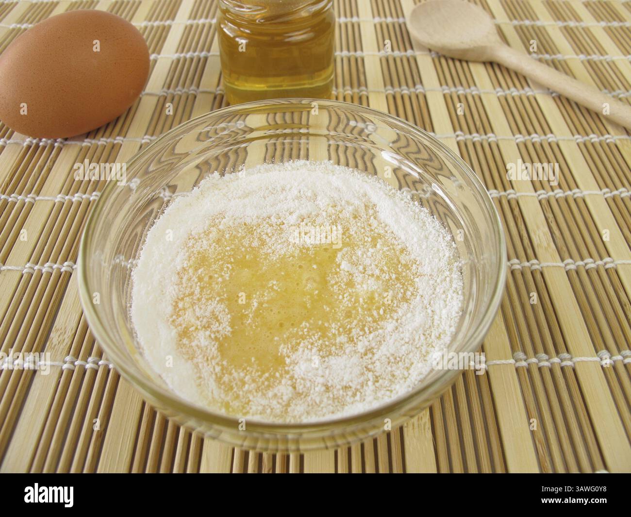Face mask for dry skin with honey, egg yolk and milk powder Stock Photo ...
