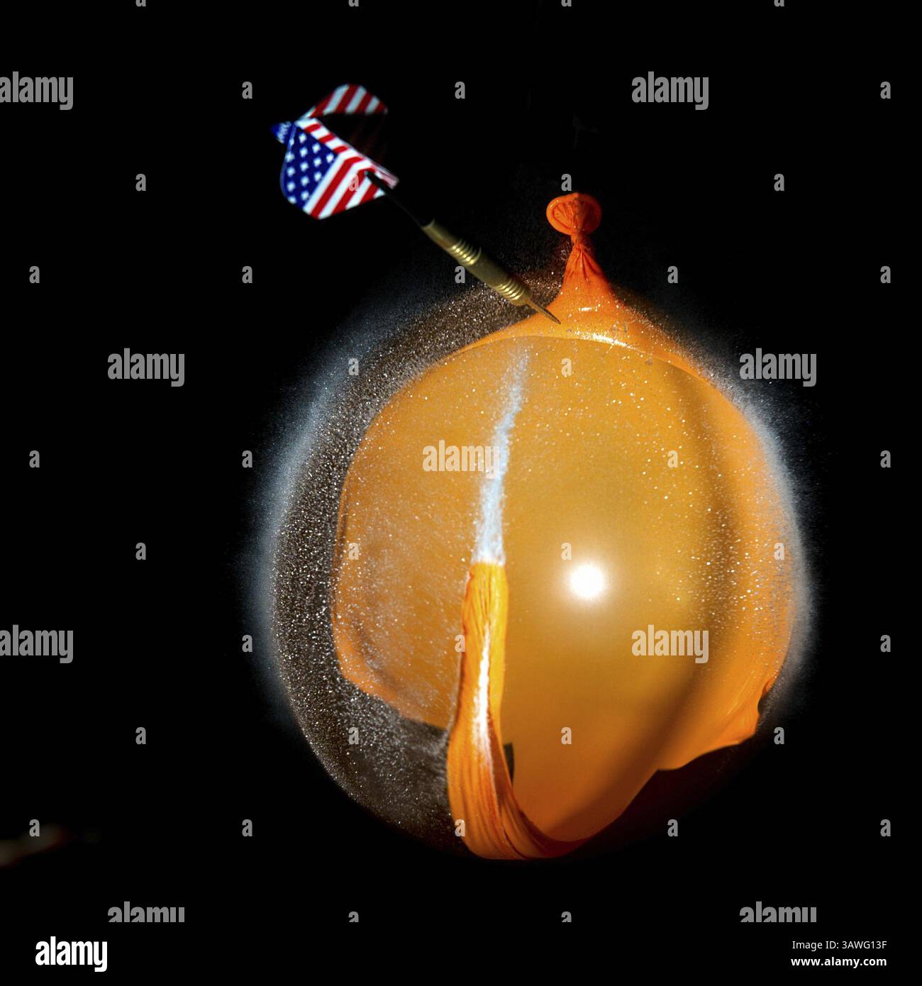 Bursting a wet balloon with dart arrow Stock Photo - Alamy