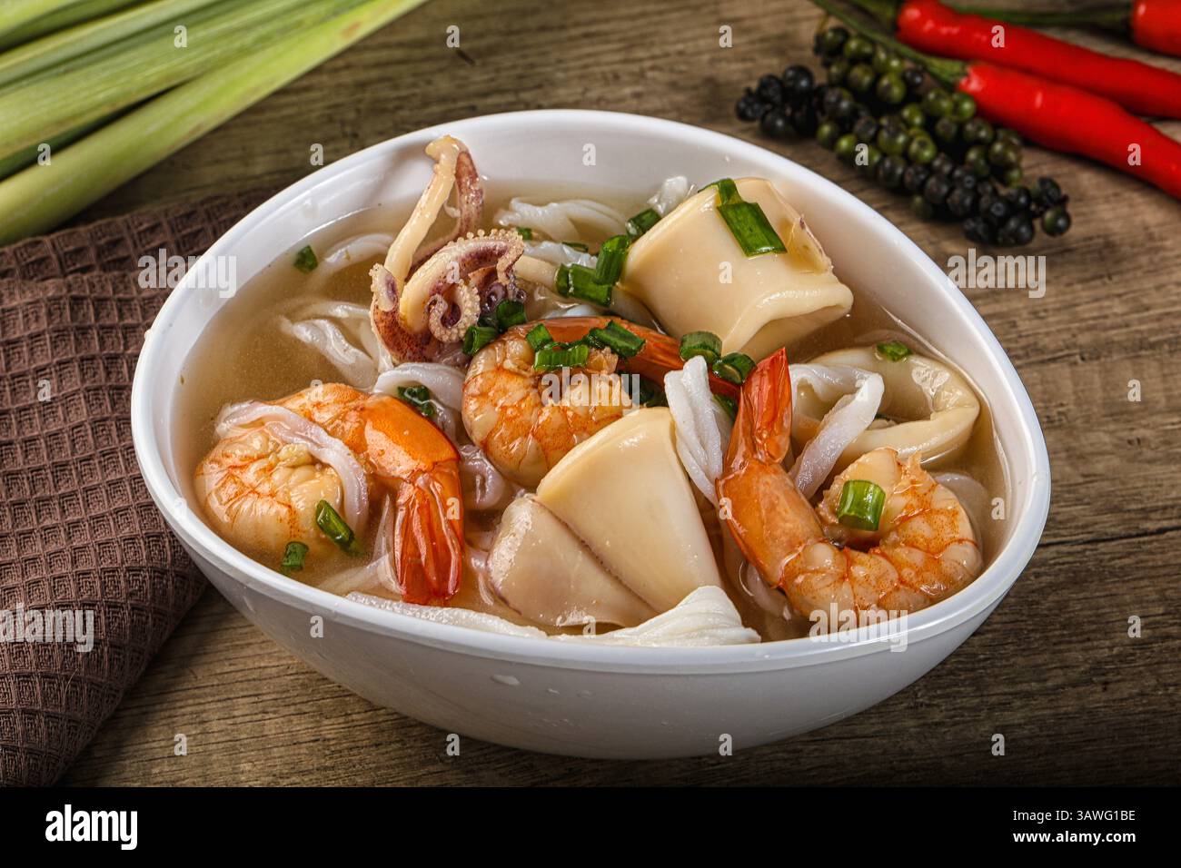 Vietnamese Pho Bo soup with seafood prawn and squid Stock Photo - Alamy