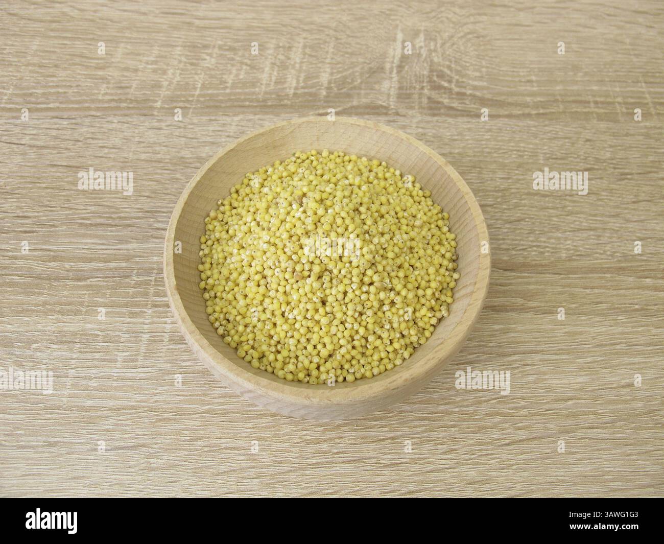 Millet grains in bowl hi-res stock photography and images - Alamy