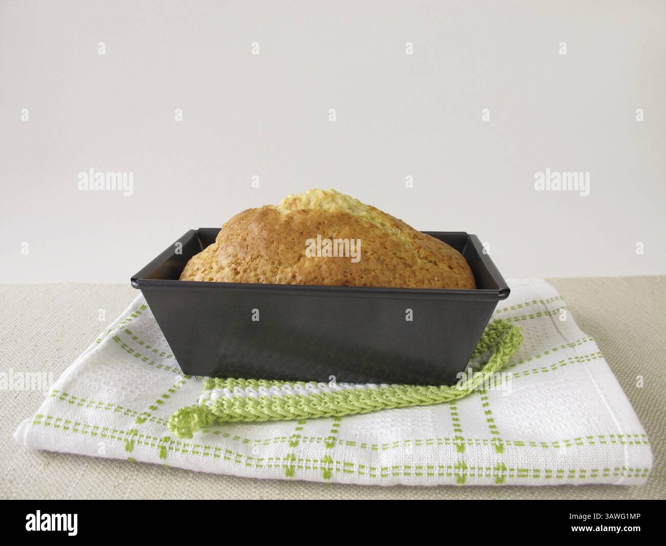 Loaf cakes in the baking tin Stock Photo - Alamy