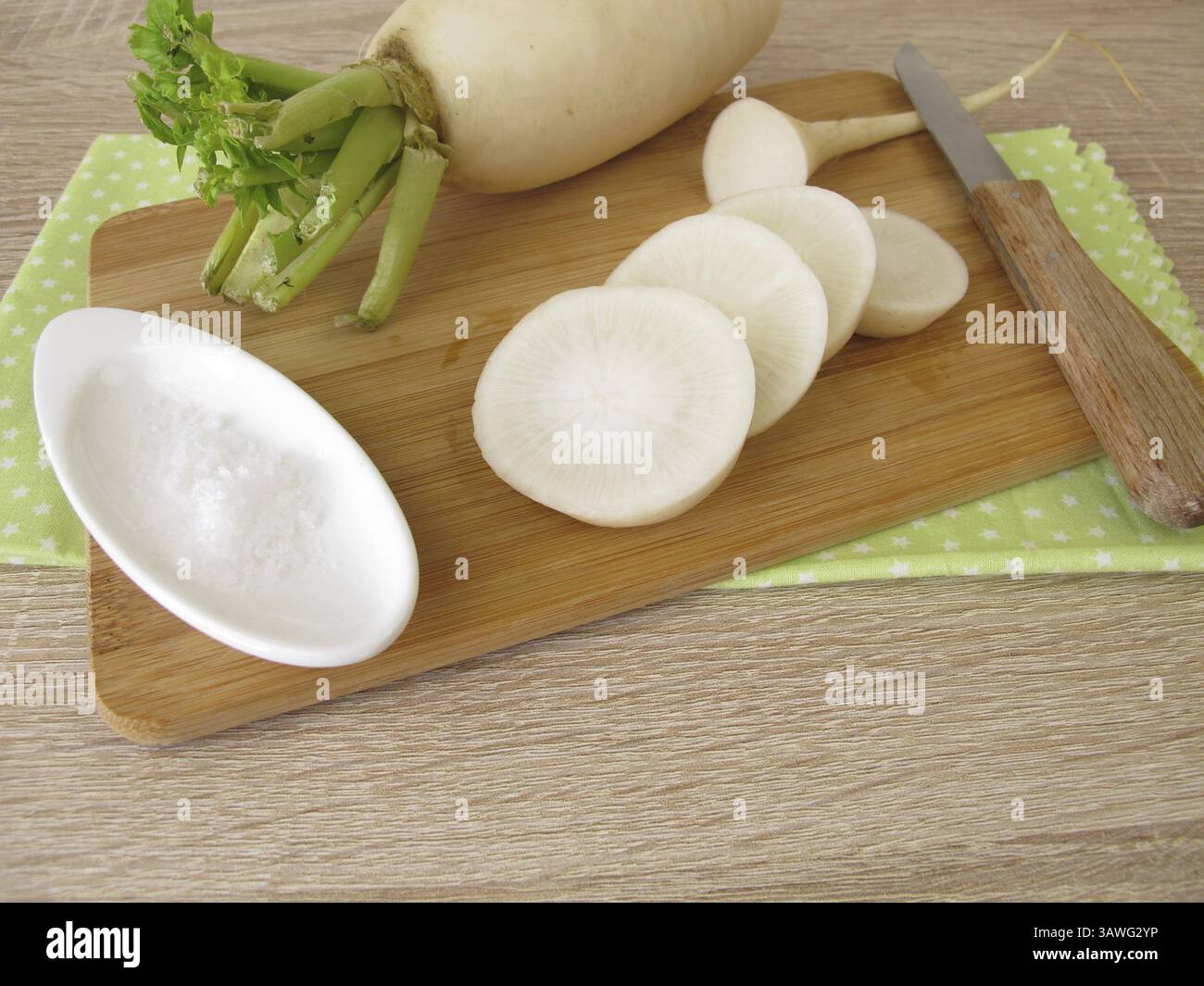 White daikon radish with salt Stock Photo - Alamy