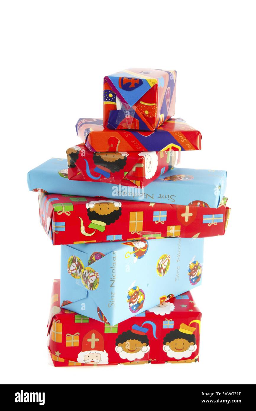 Stacked dutch Sinterklaas presents isolated over white background Stock ...