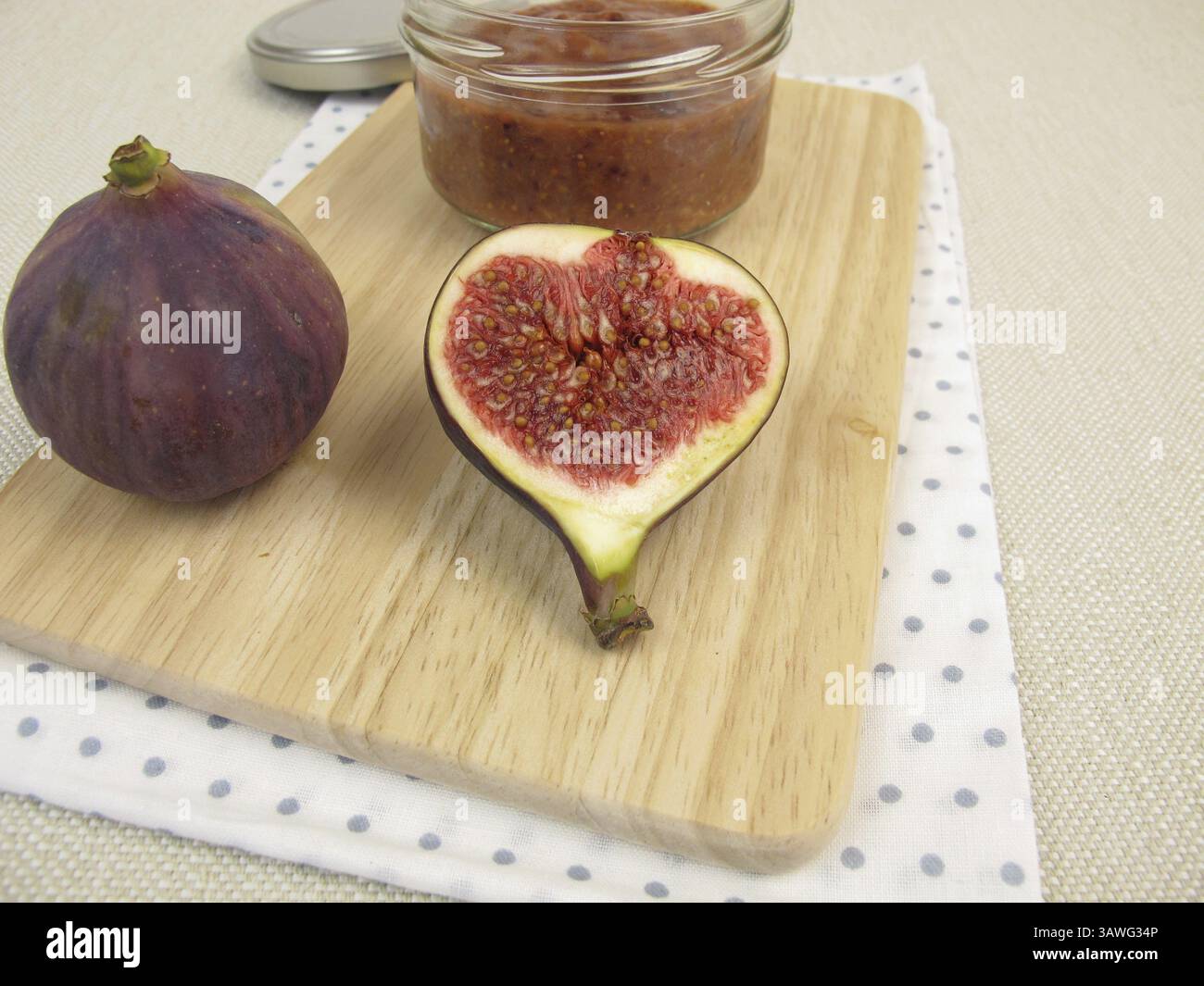 Homemade fig jam in a jar and fresh figs Stock Photo - Alamy