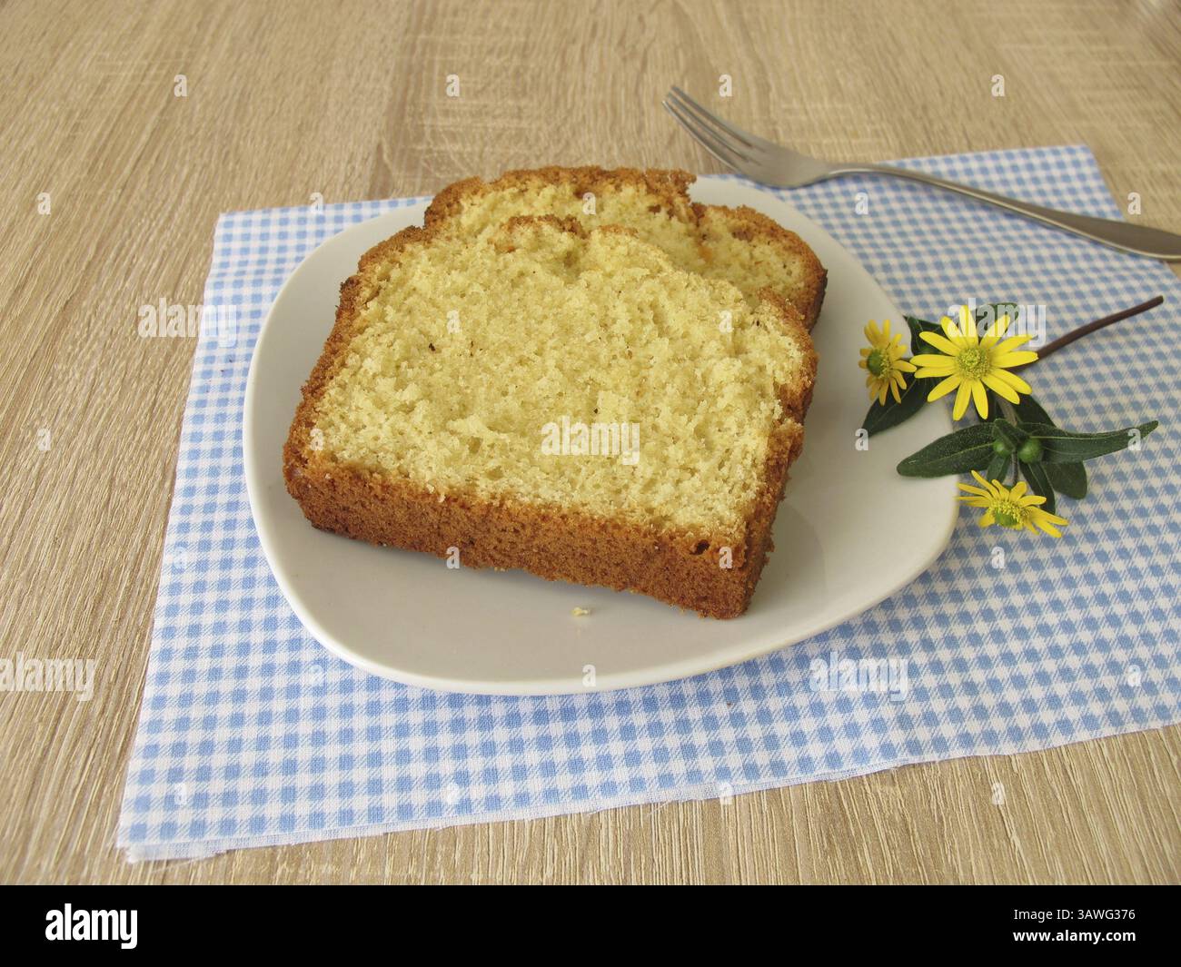 Classic sand cake in slices Stock Photo - Alamy