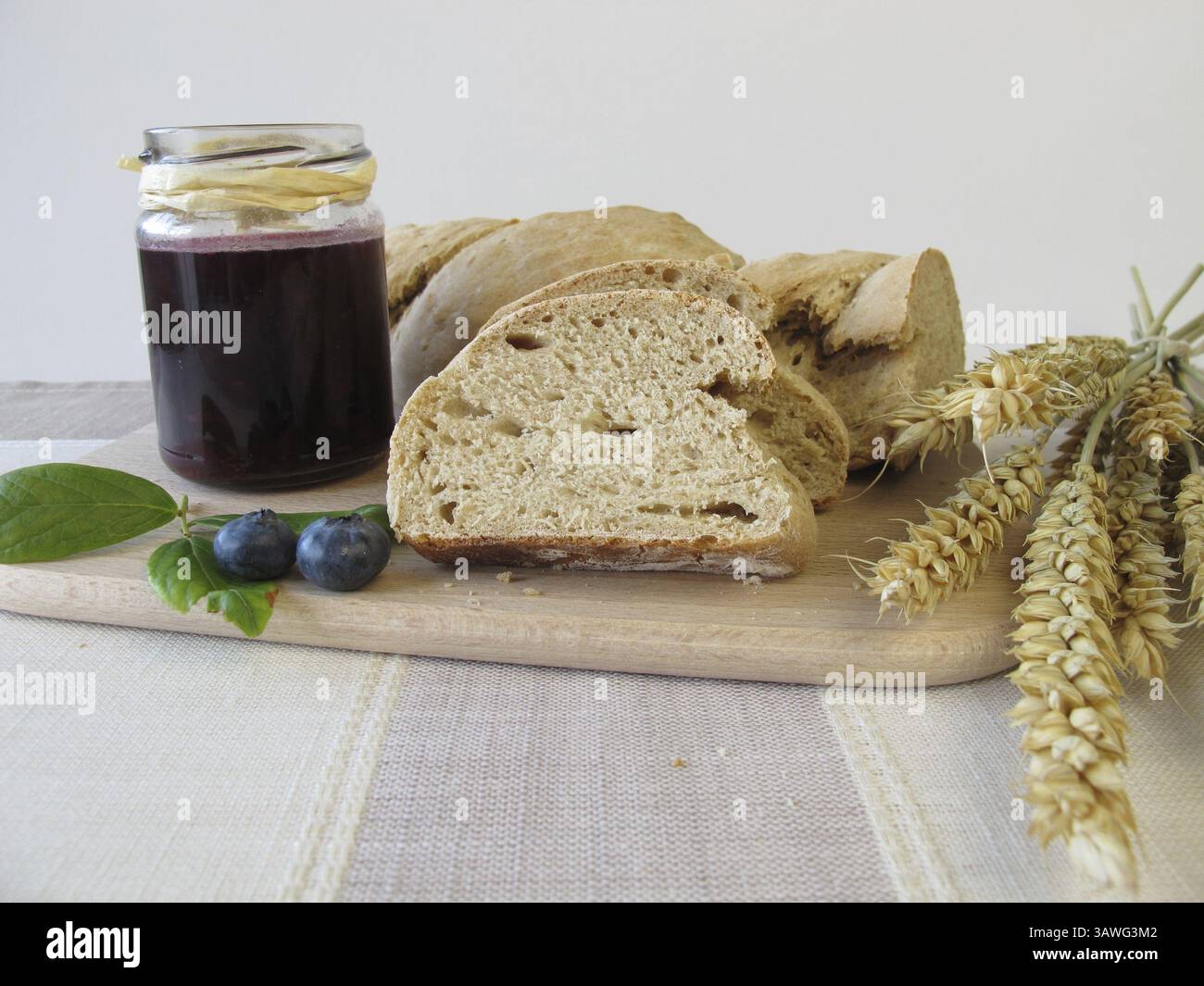 Root bread and blueberry jam Stock Photo - Alamy