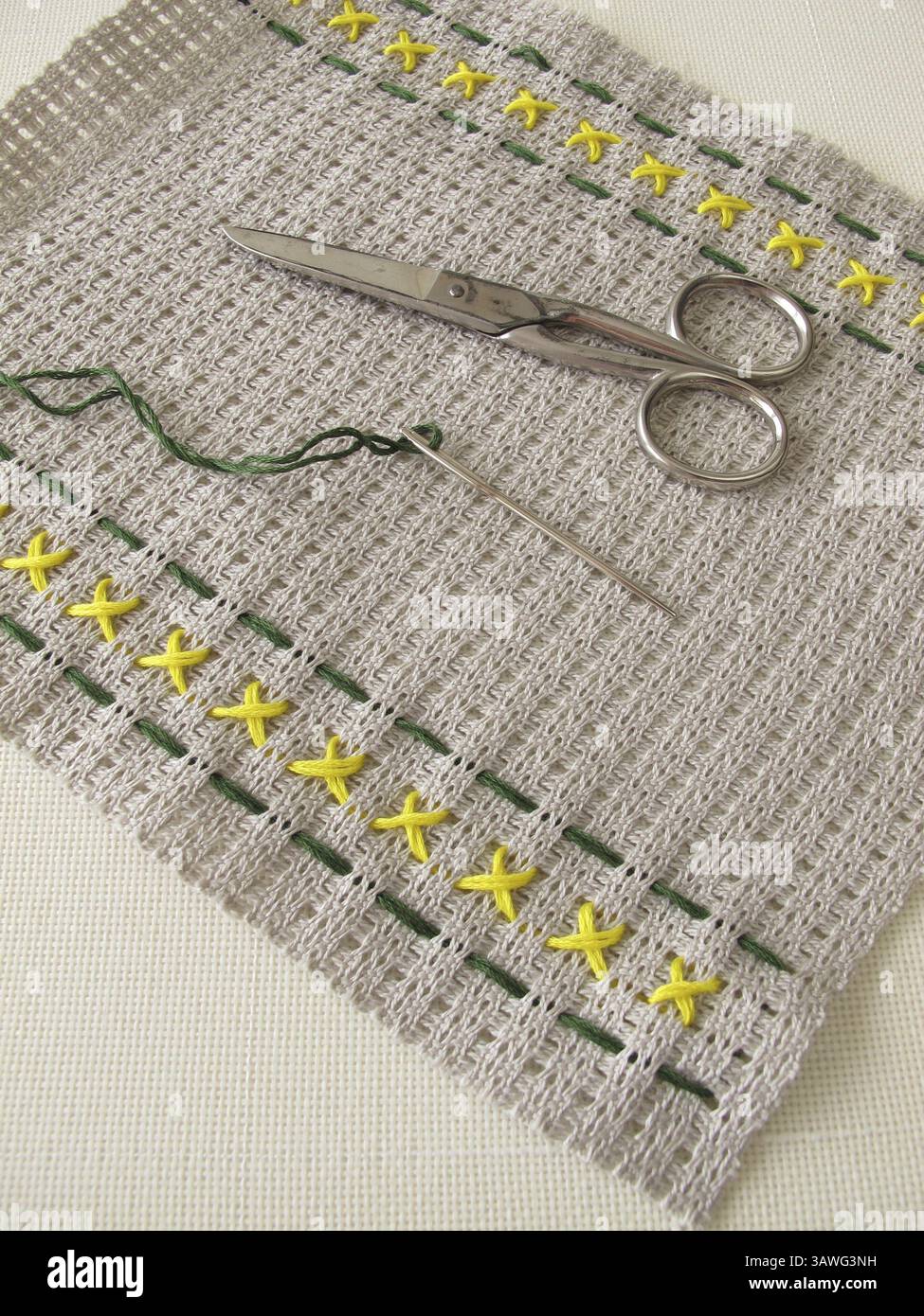 Embroidery pattern on canvas Stock Photo - Alamy