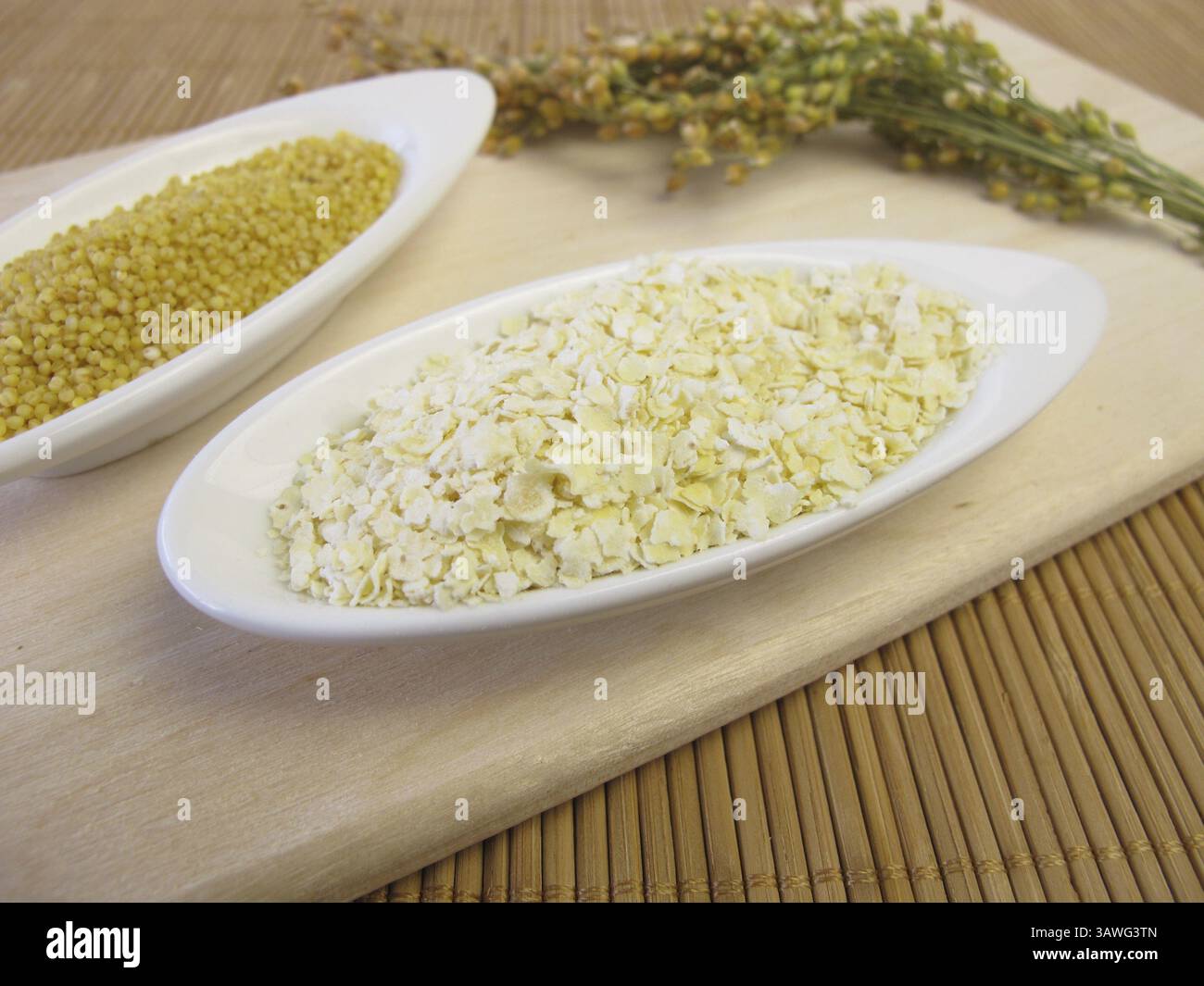 Millet, millet grains and millet flakes Stock Photo - Alamy