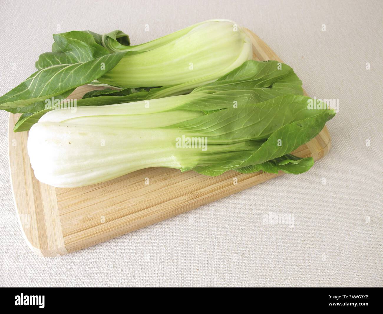 Cutting pak choi chinese kitchen hi-res stock photography and images ...