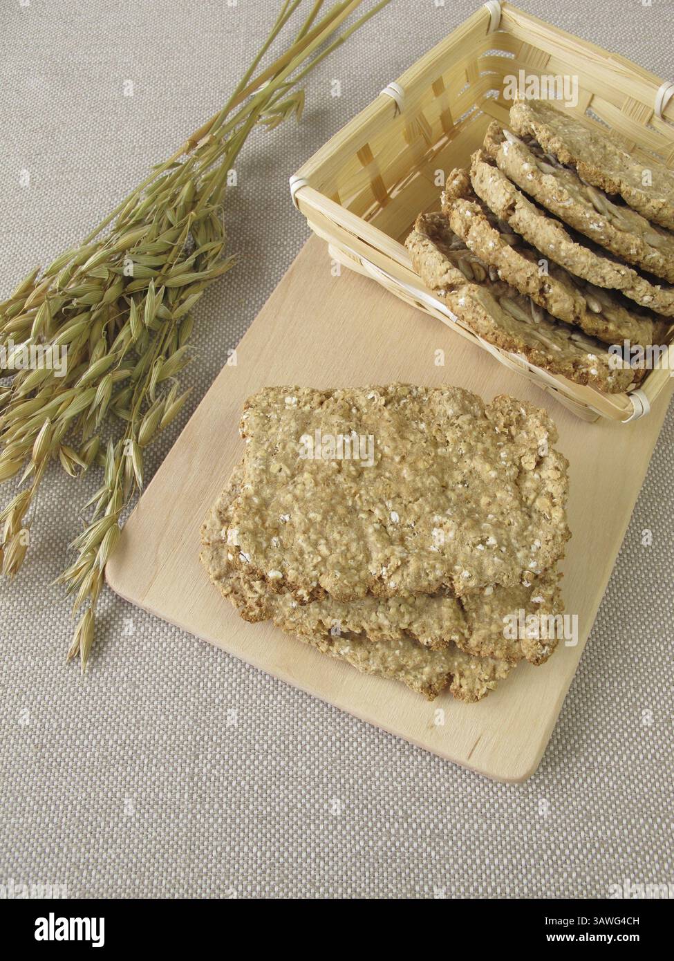 Round and square oat crispbread Stock Photo - Alamy