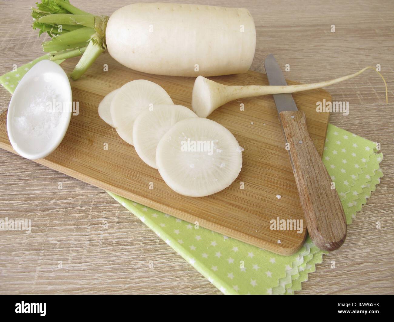 White daikon radish with salt Stock Photo - Alamy