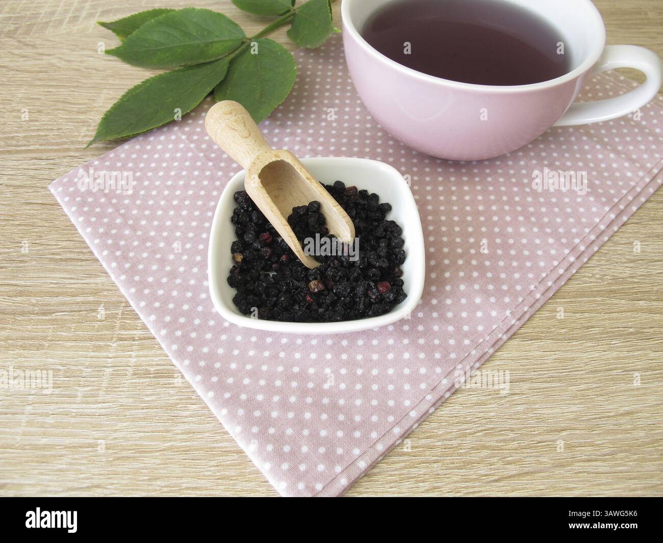Decoction, boiled tea with dried elderberries Stock Photo - Alamy