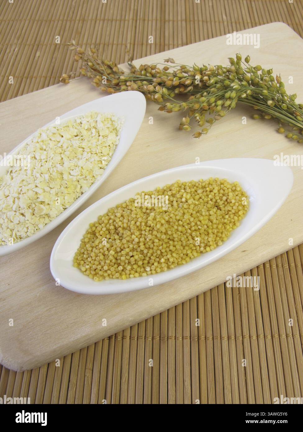 Millet, millet grains and millet flakes Stock Photo - Alamy