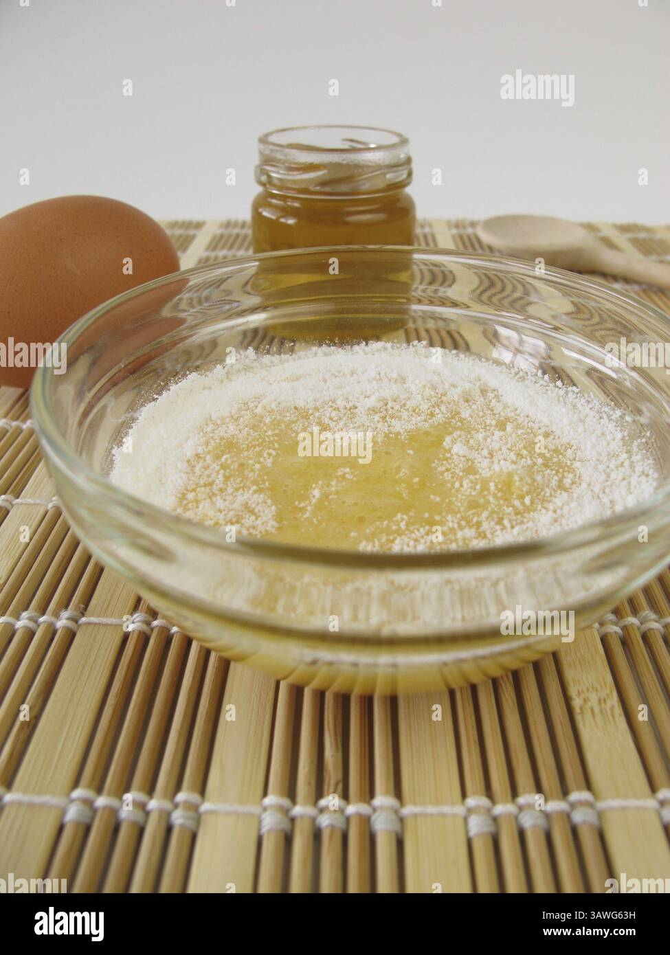 Face mask for dry skin with honey, egg yolk and milk powder Stock Photo ...