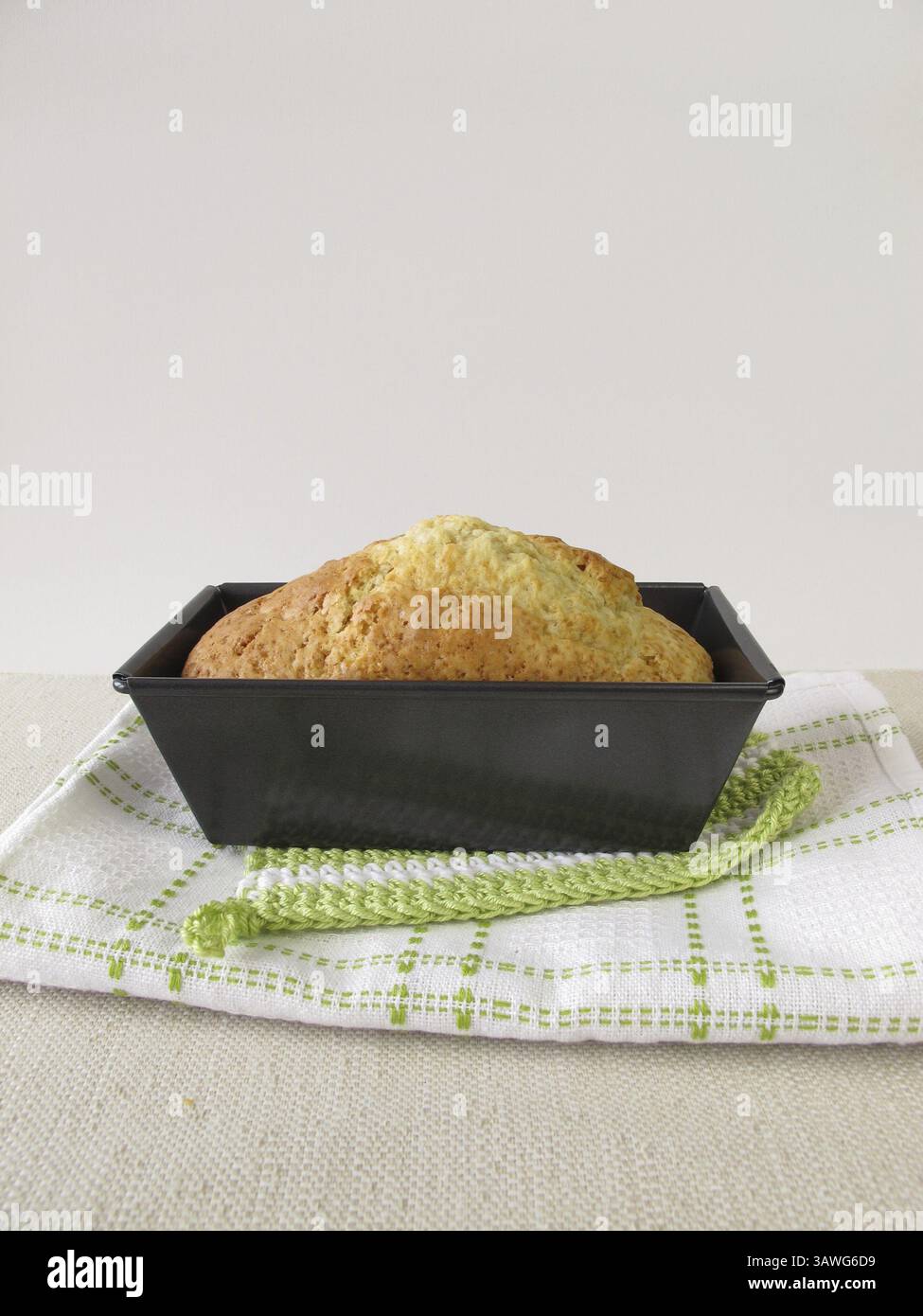 Loaf cakes in the baking tin Stock Photo - Alamy
