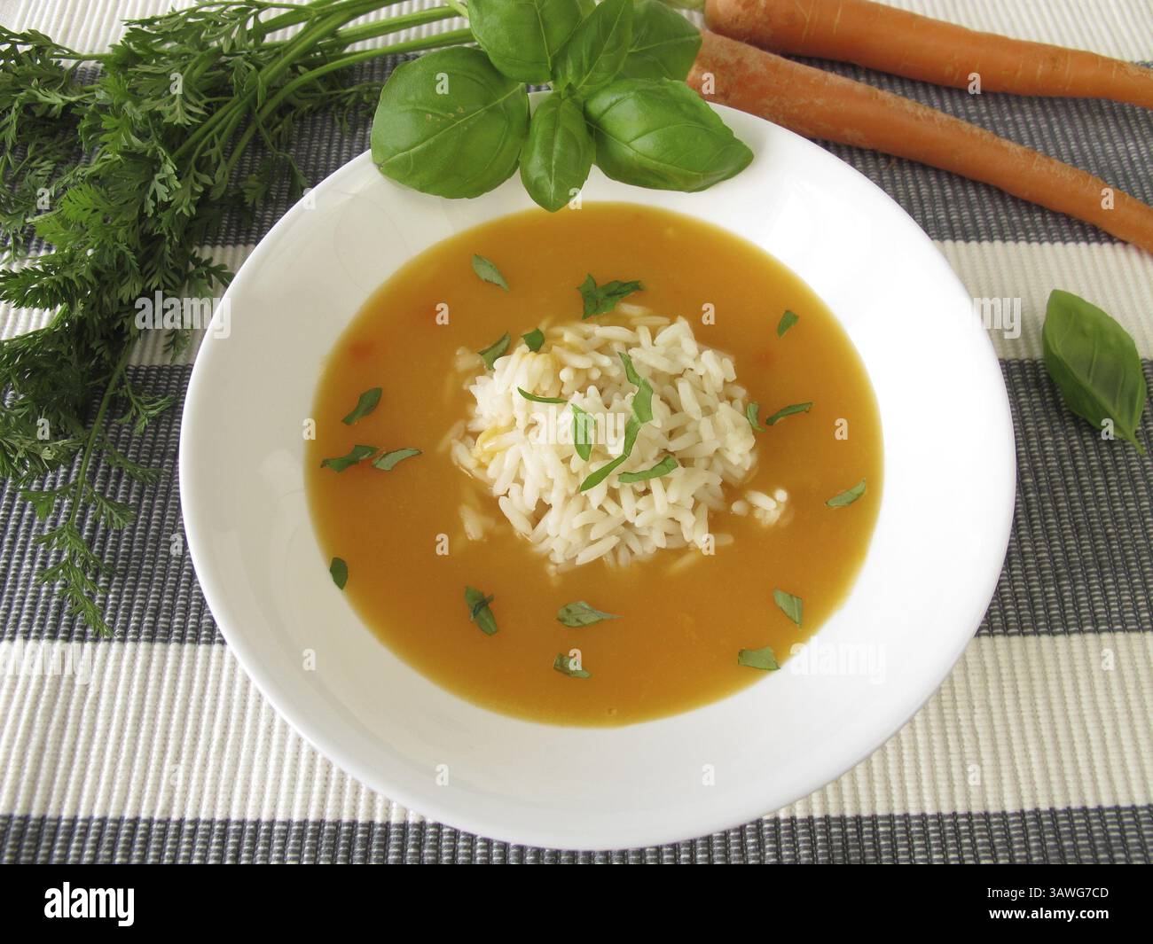 Cream carrot soup rice hi-res stock photography and images - Alamy