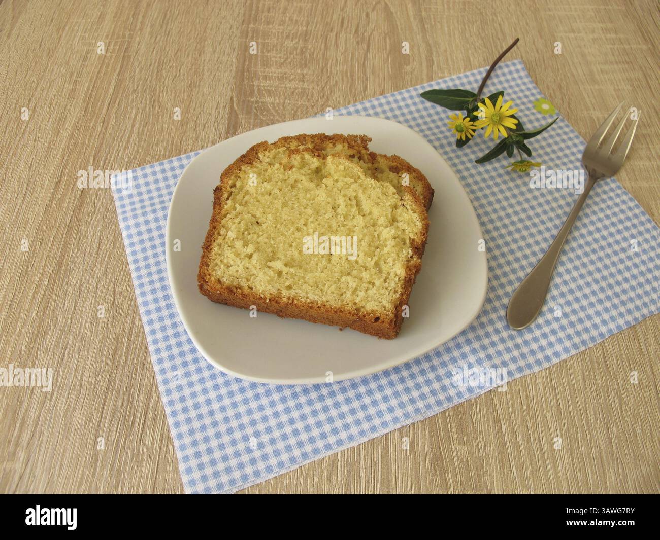 Classic sand cake in slices Stock Photo - Alamy