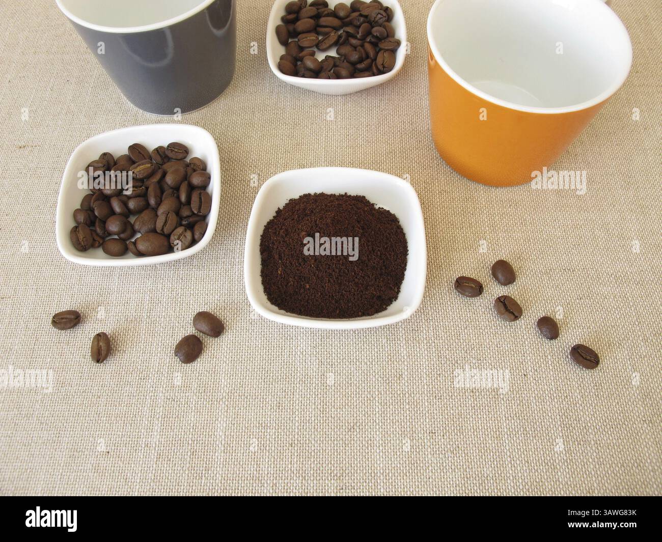 Roasted Arabica coffee beans and ground coffee Stock Photo - Alamy