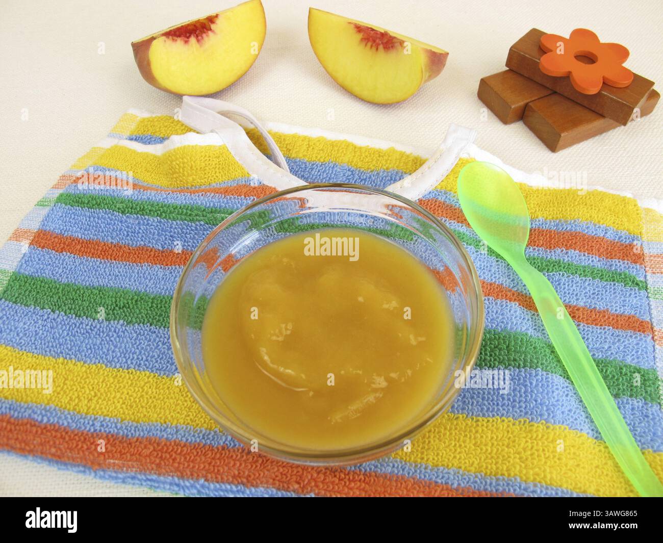 Fruit porridge with peach for babies and toddlers Stock Photo - Alamy