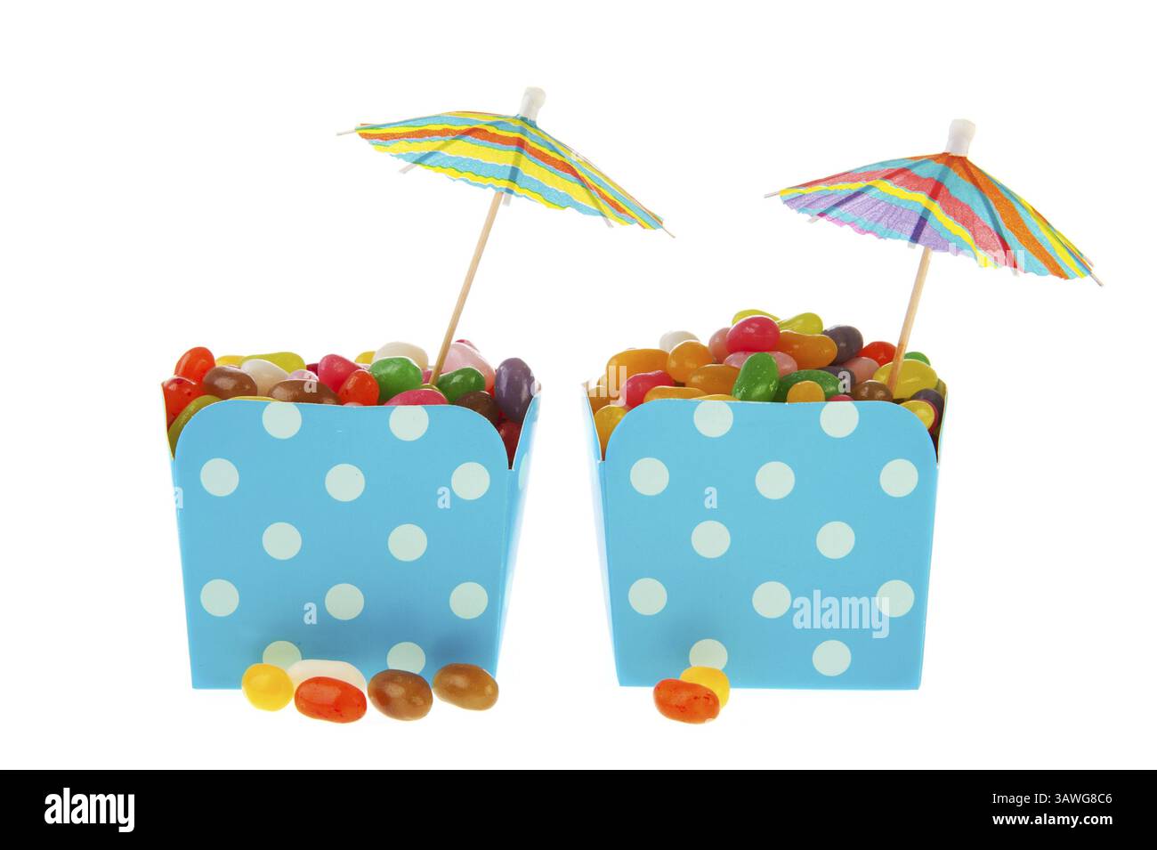 Two blue dotted cartons full with colourful candy in the summer Stock ...