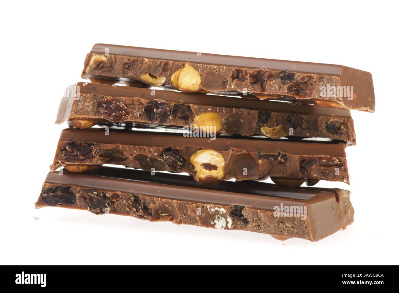 Stacked chocolate chunks with nuts and raisins Stock Photo - Alamy