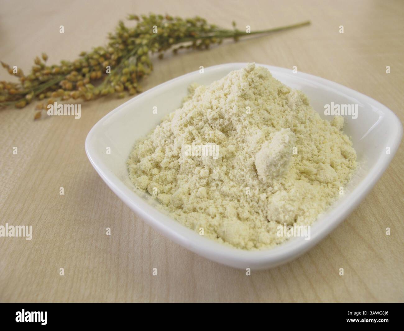 Millet flour and millet Stock Photo - Alamy
