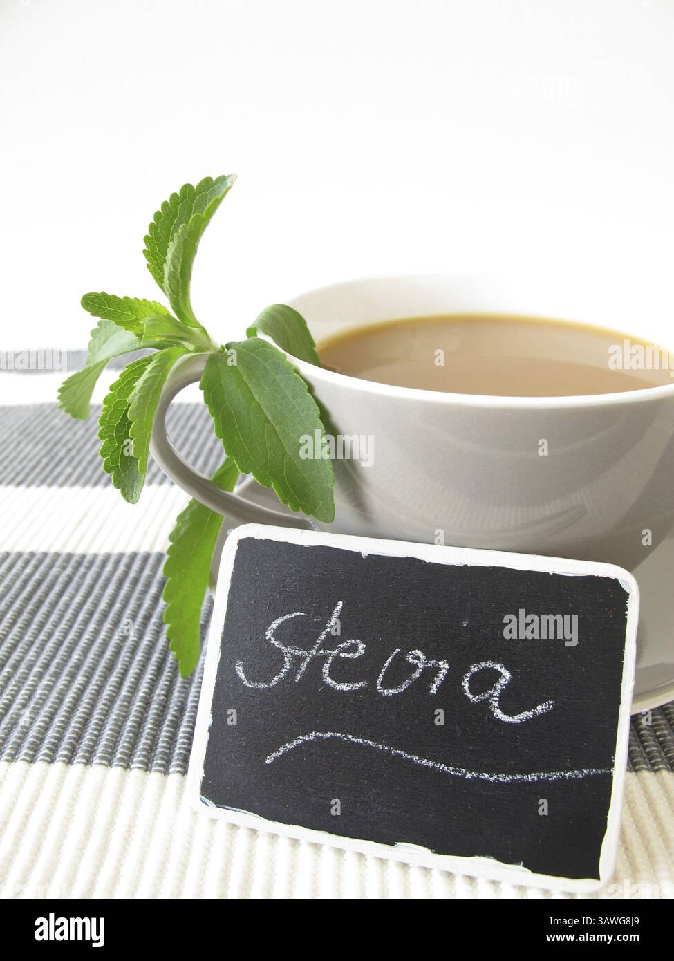 Latte with stevia and labelled board Stock Photo - Alamy