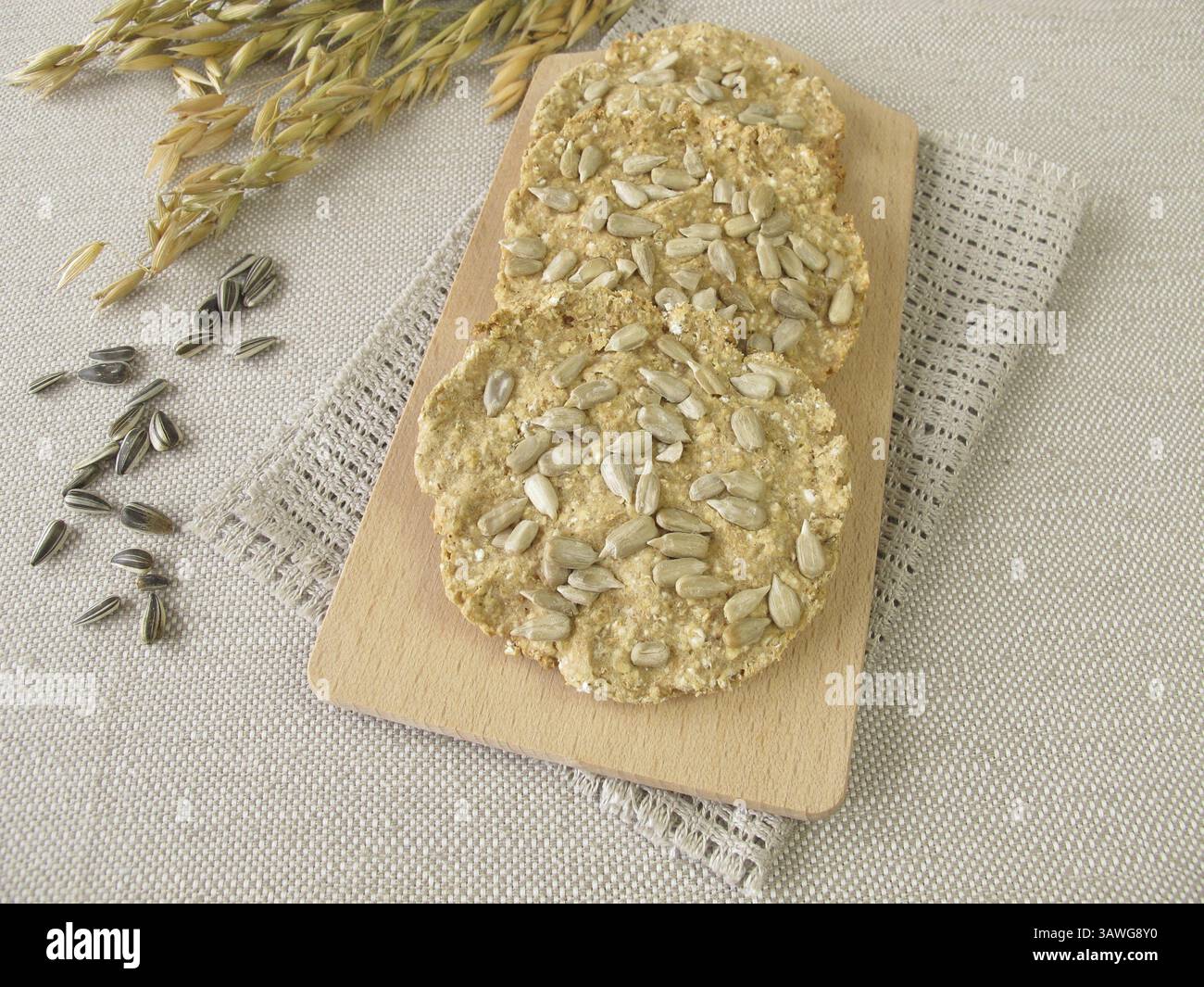 Round oat crispbread with sunflower seeds Stock Photo - Alamy