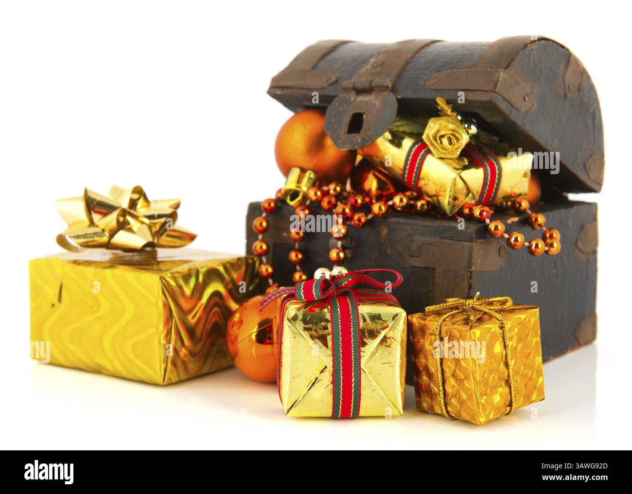 Old treasury box full with golden balls and presents Stock Photo - Alamy