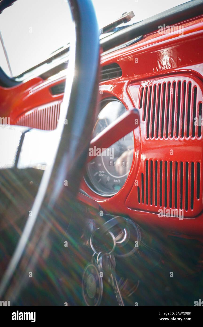 Red old car steering wheel and dashboard or interior close up Stock ...