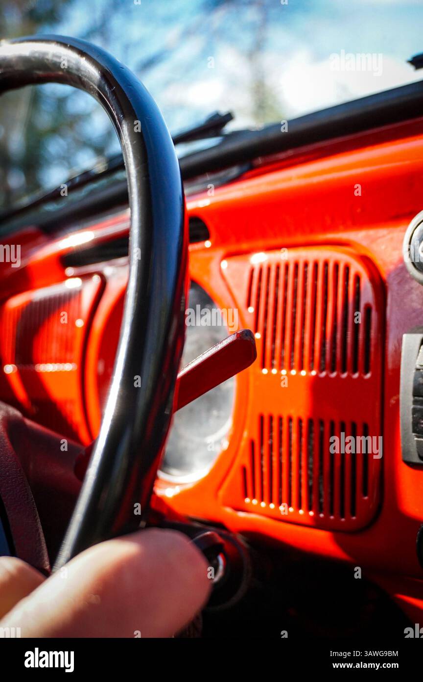 Red old car steering wheel and dashboard or interior close up Stock ...