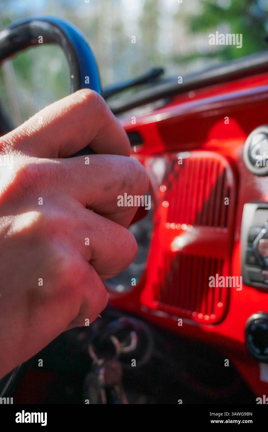Red old car steering wheel and dashboard or interior close up Stock ...