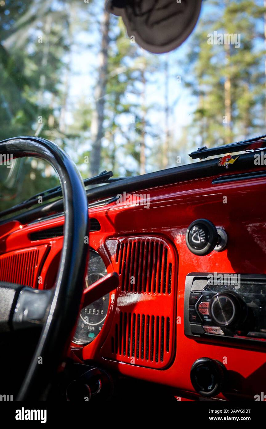 Red old car steering wheel and dashboard or interior close up Stock ...