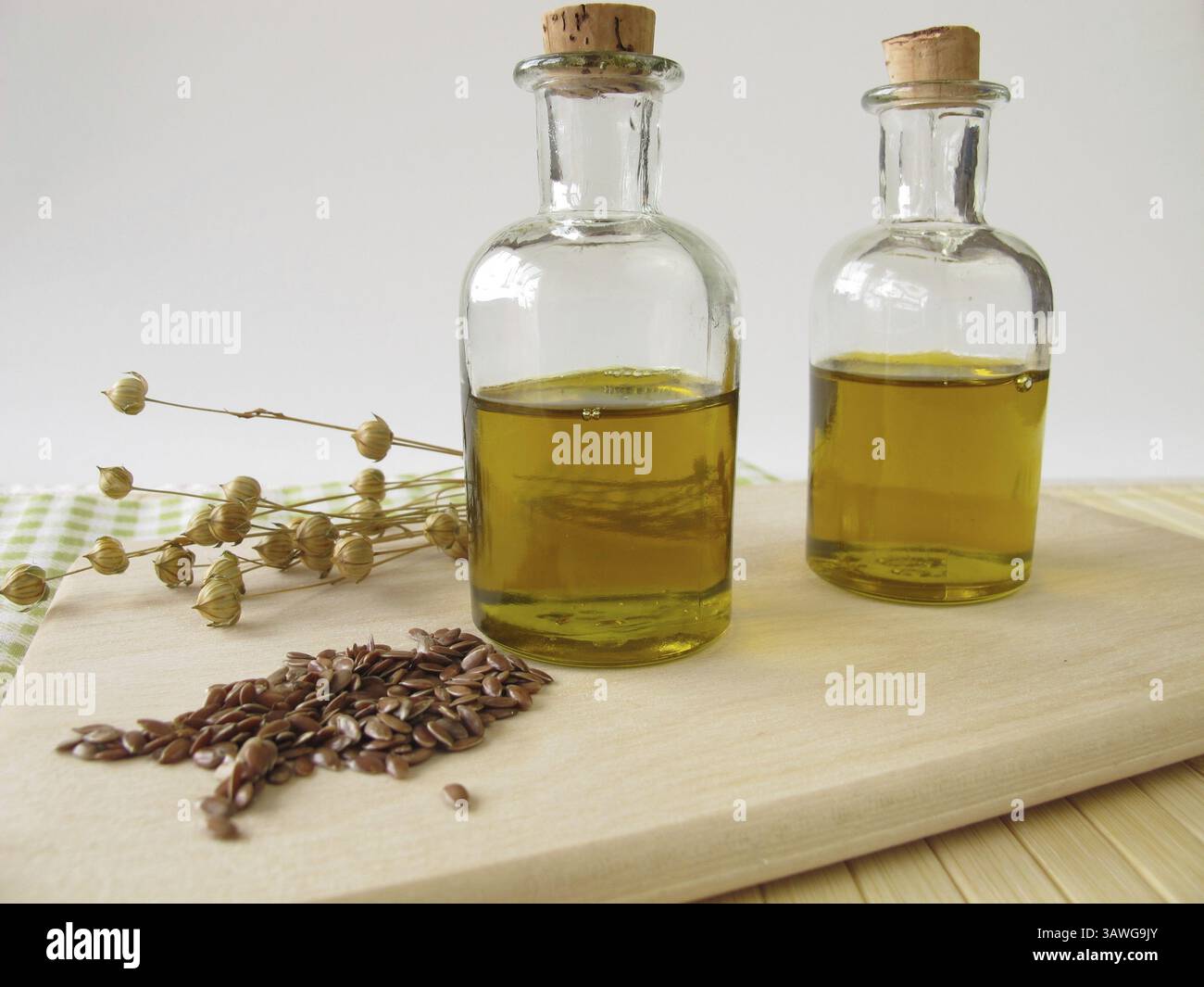 Linseed oil in small bottles Stock Photo - Alamy