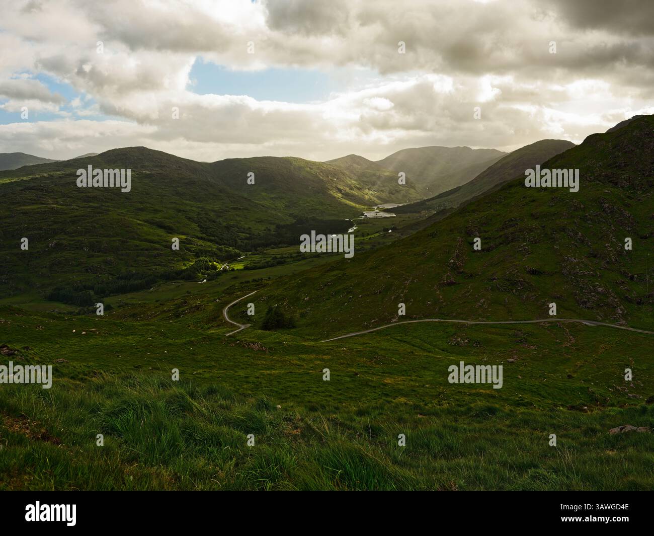 This photo depicts a captivating view of an Irish landscape, featuring ...