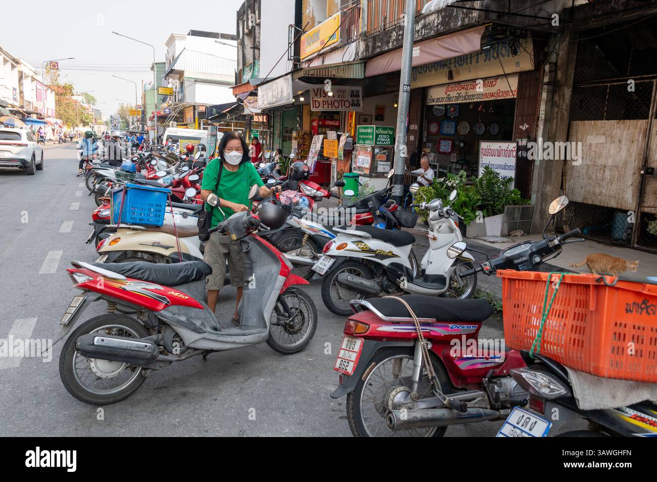 The streets in and around the old city of Chiang Mai are full of ...