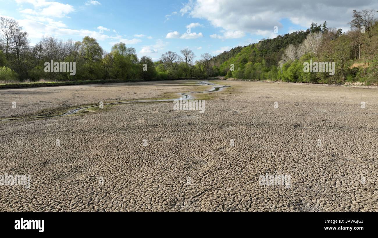 Drought pond soil cracked crust wetland water, swamp drone aerial ...