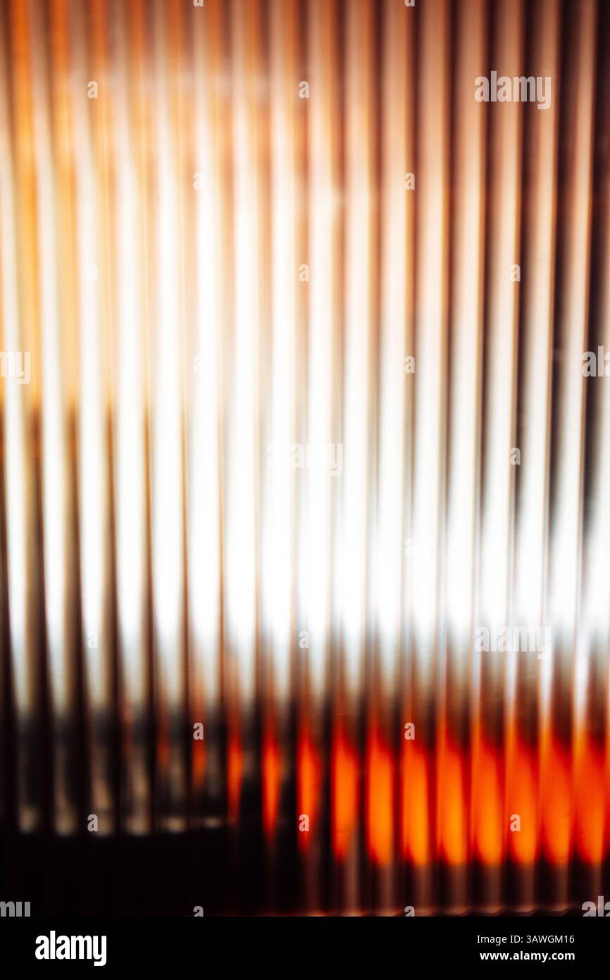 An abstract composition with vertical lines and blurred light, creating ...