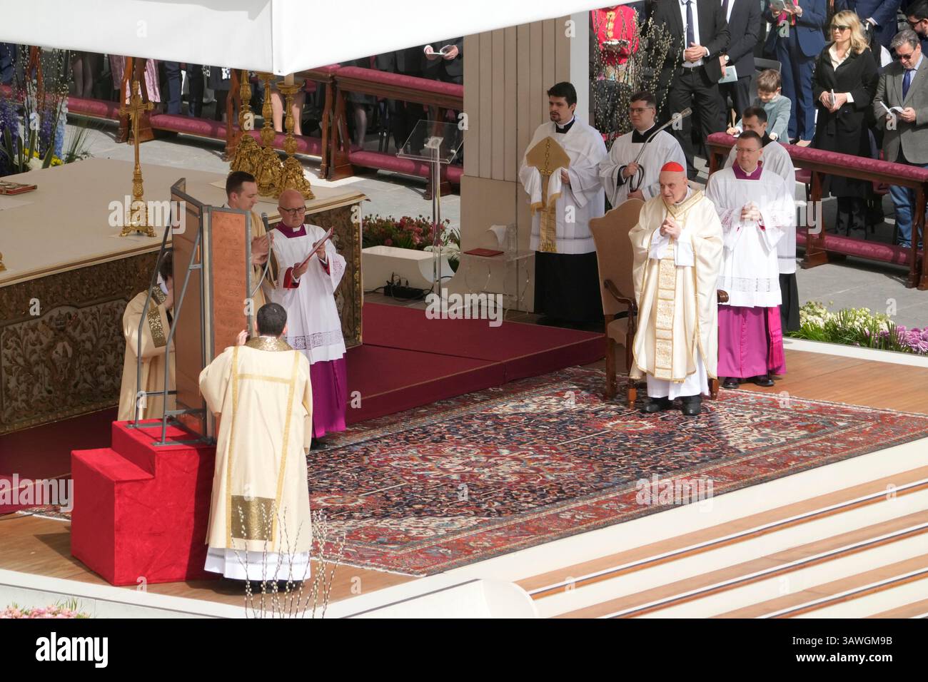 Cardinal Angelo Comastri, right, presides over the Easter mass in St ...