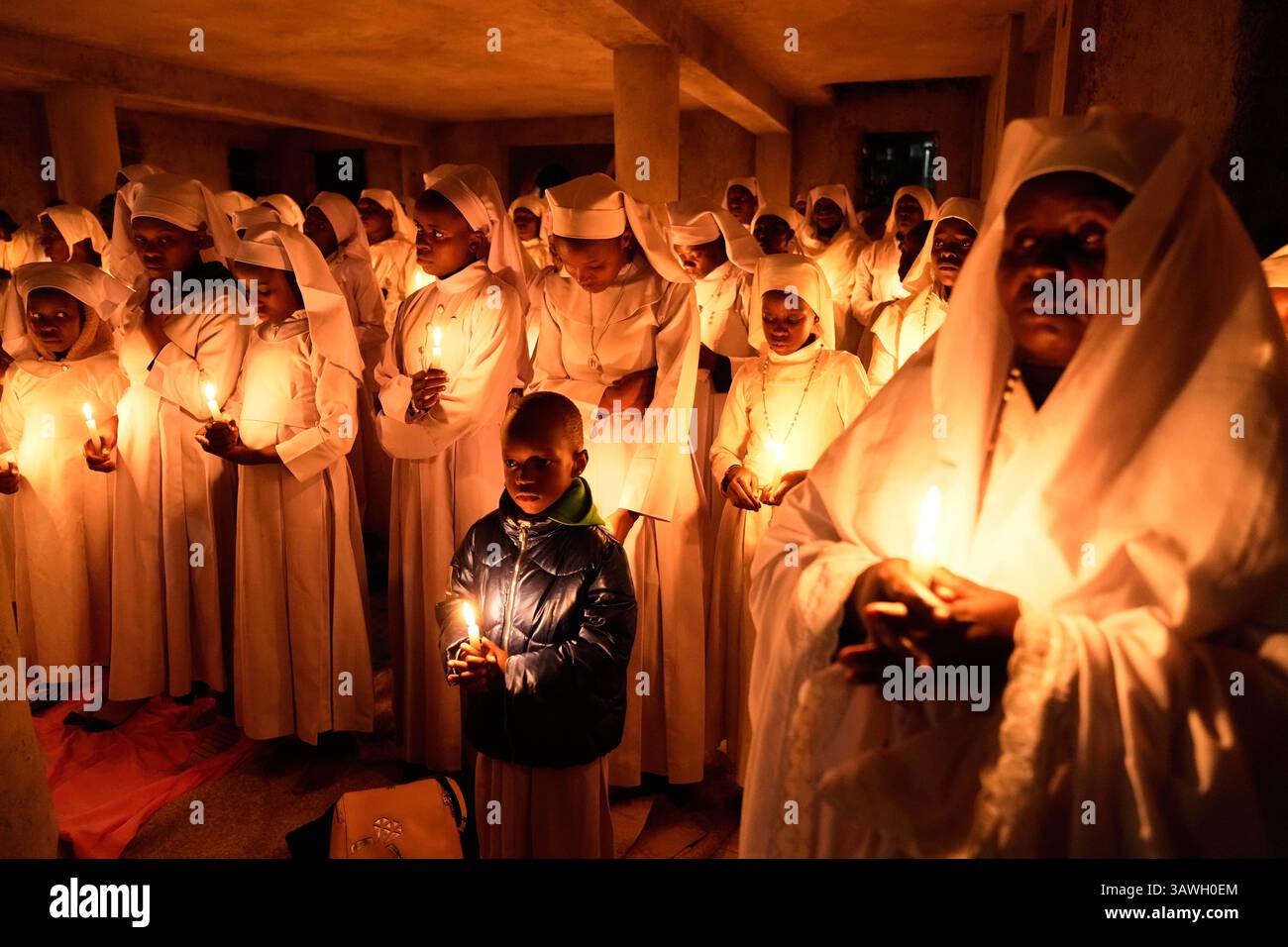 Christian faithful of the Legio Maria African Mission, attend the ...
