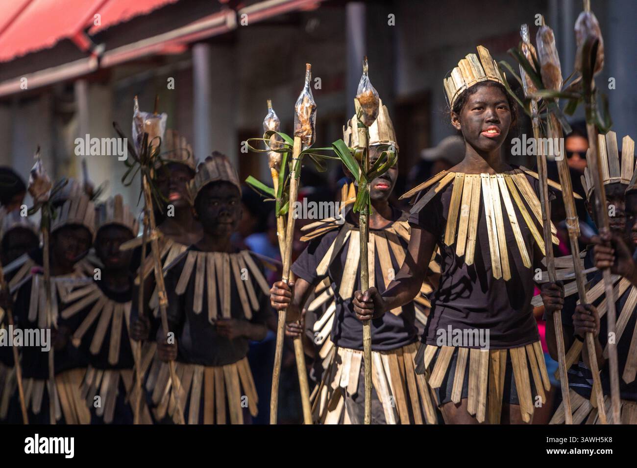 Young Ati-Ati Festival dancers painted black and wearing costumes made ...