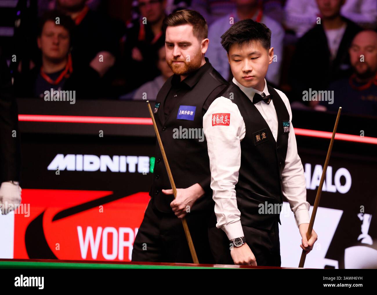 Jak Jones (left) during his match against Zhao Xintong during day two ...
